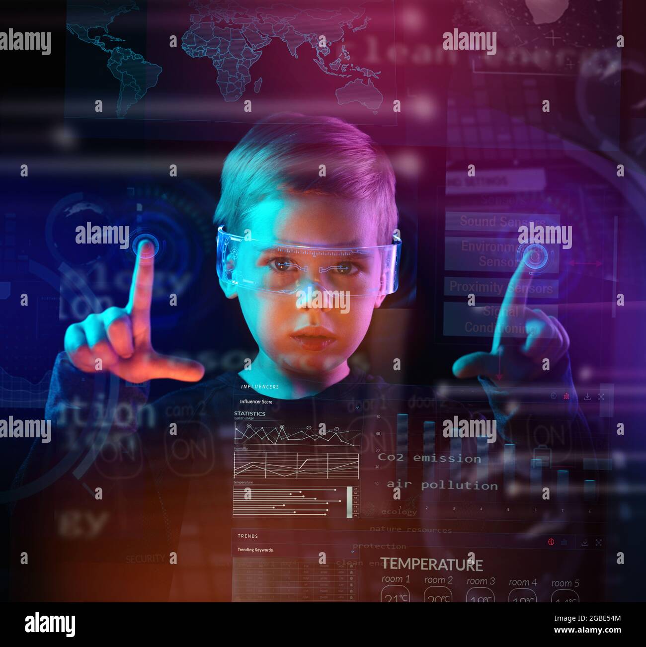 Portrait of a smart, cute boy using a futuristic digital devices Stock ...