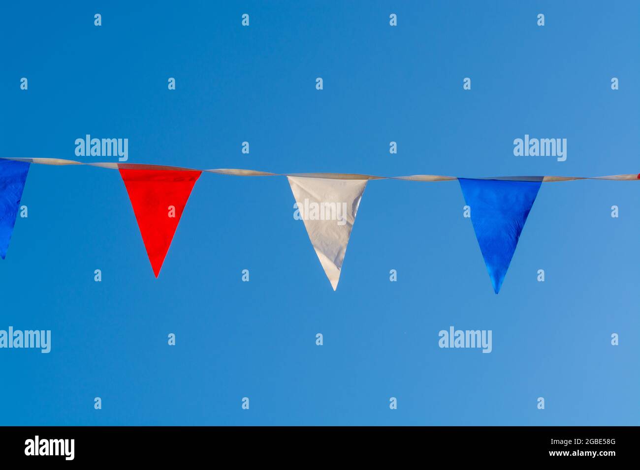 Colorful garland with colors of Dutch flag, white, red and blue in ...