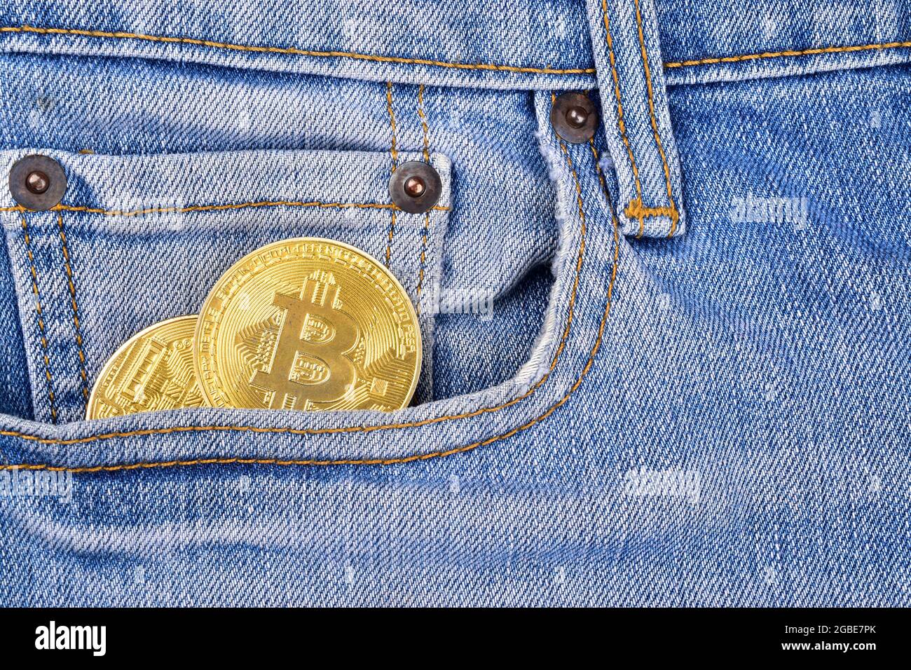 Bitcoin in Jeans Pocket Stock Photo - Alamy
