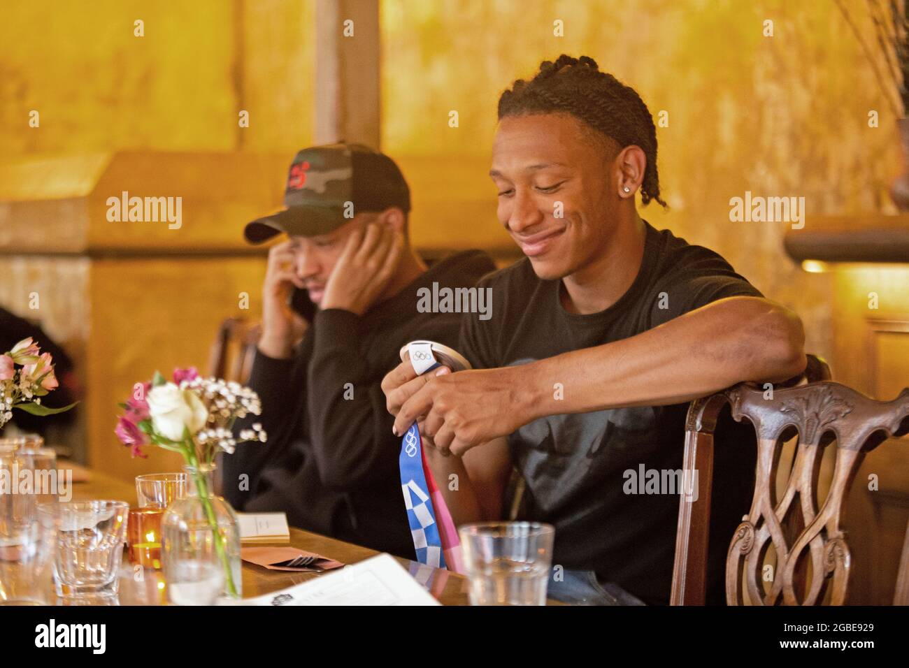 Silver medallist BMXer Kye Whyte (right) at a welcome home party at the ...