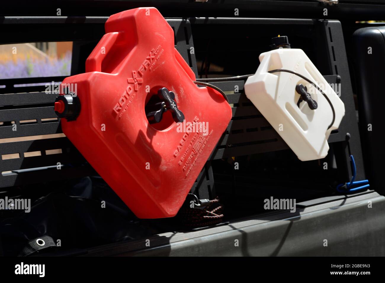 A spare gasoline container and water container made by RotoPax on the ...