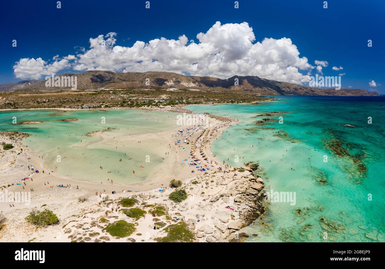 Aerial panoramic view of a narrow sandy beach and beautiful tropical ...