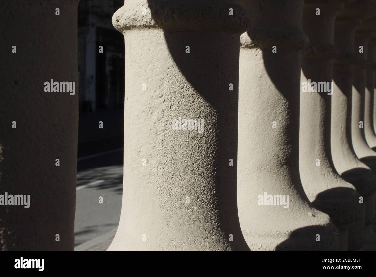 Closeup of columns of fences in a park under the sunlight Stock Photo ...