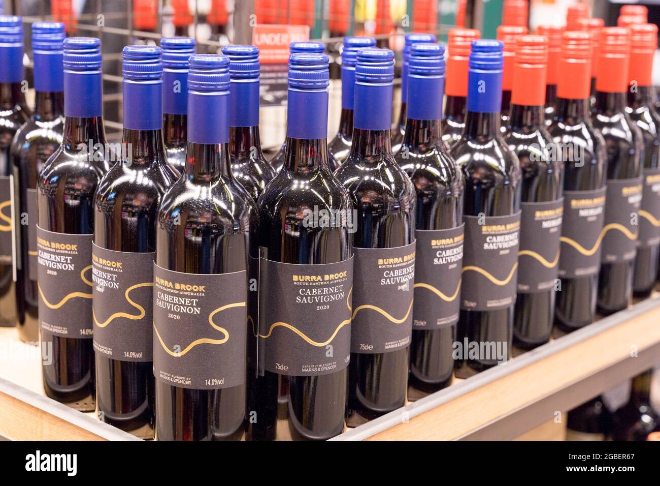 many bottles of CABERNET SAUVIGNON 2020 wines lay out in a tray Stock ...