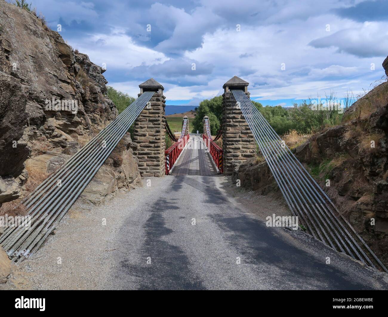 The Ophir suspension bridge is a classic one-way red bridge built ...