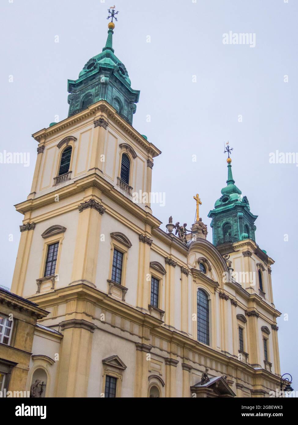 Low-angle shot of the Holy Cross Church in Warsaw, Poland Stock Photo ...