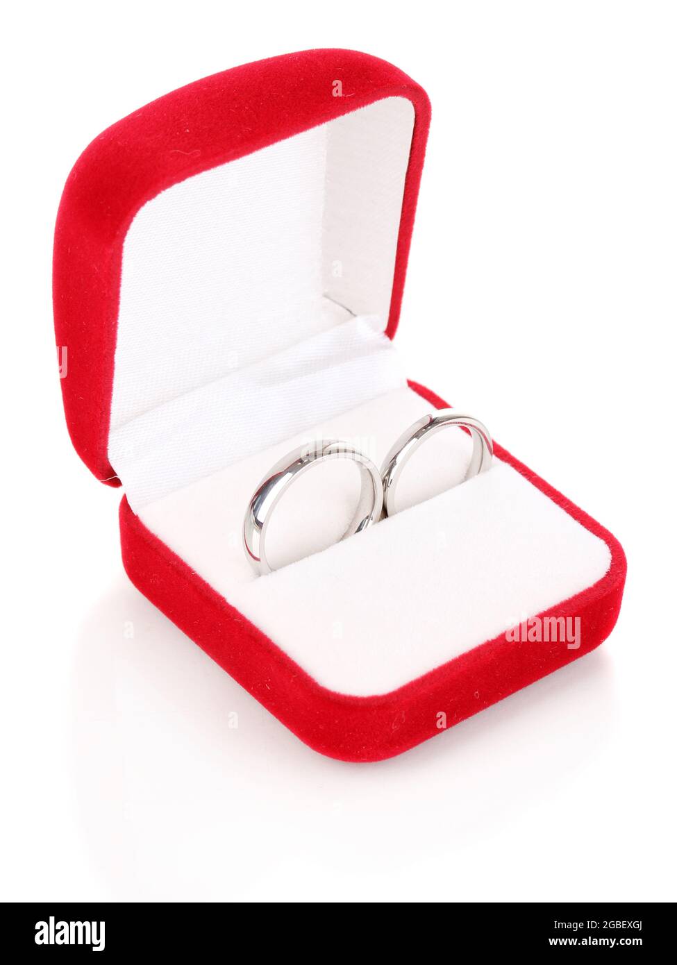 Wedding rings in red box isolated on white Stock Photo - Alamy