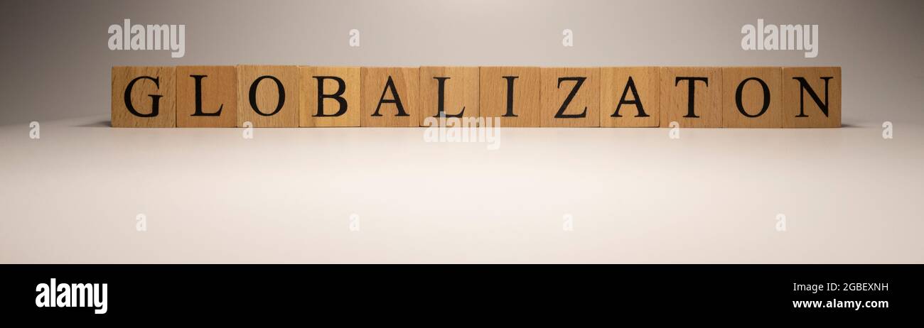 The name Globalization was created from wooden letter cubes. Economics ...
