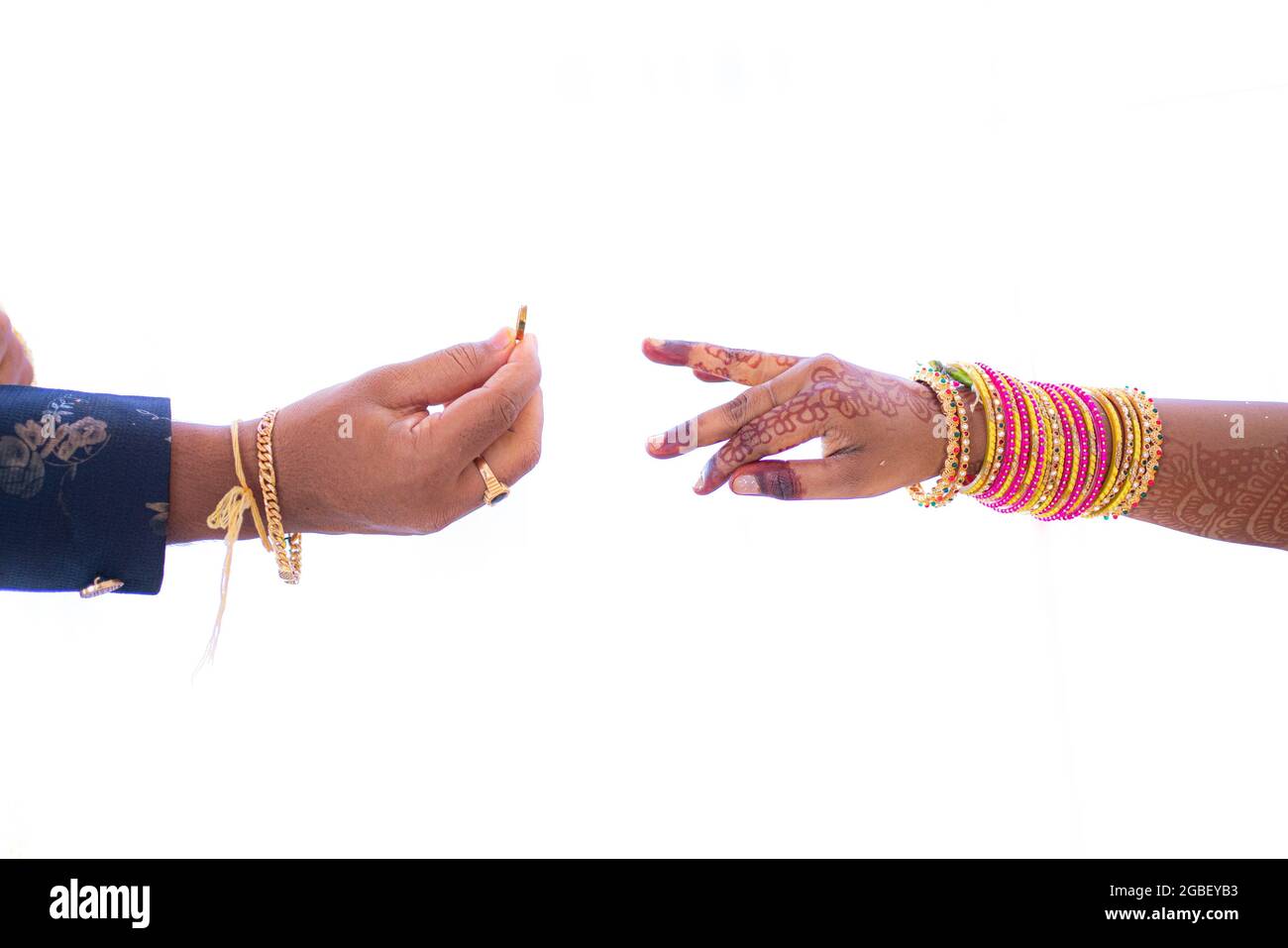 Close up of a bride and groom purposing during wedding in India with an ...