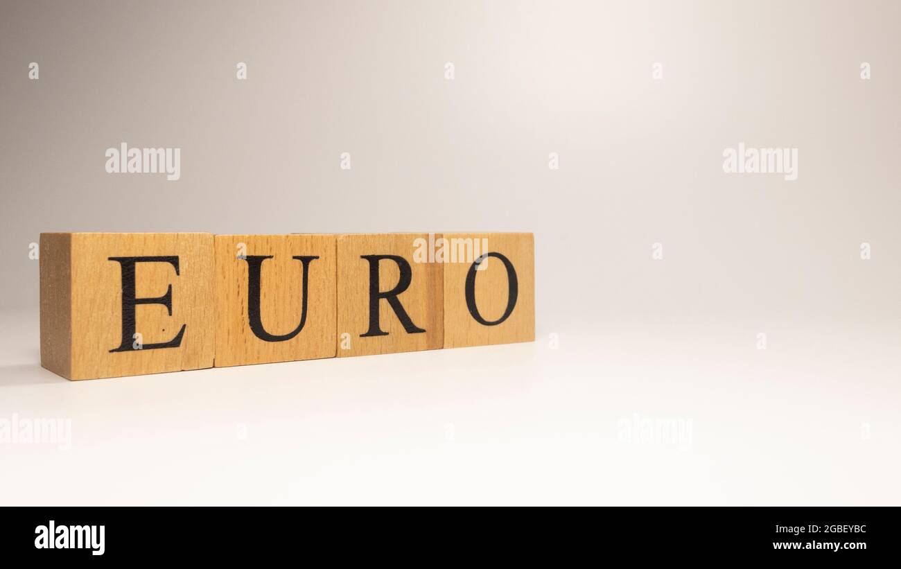 The name Euro was created from wooden letter cubes. Economics and ...