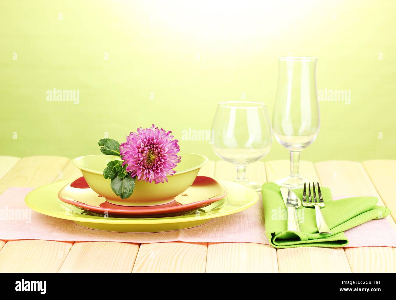 Table setting on bright background close-up Stock Photo - Alamy