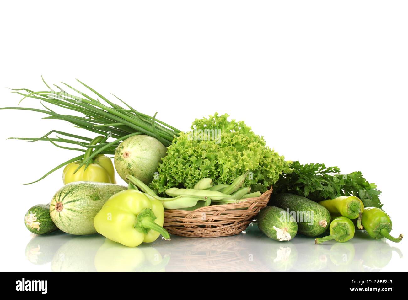 fresh green vegetables in basket isolated on white Stock Photo - Alamy