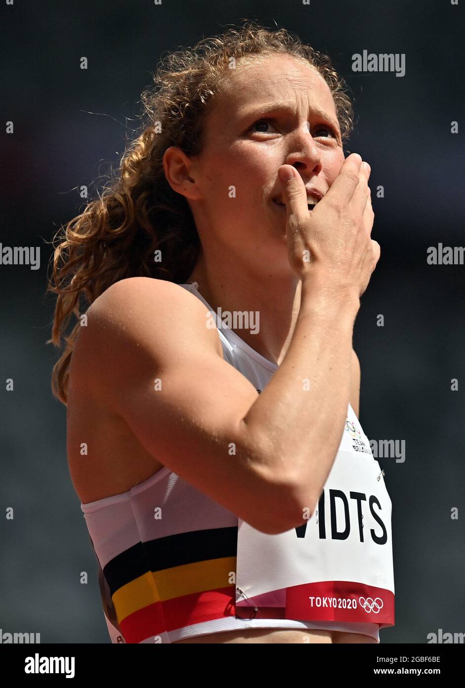 Belgian Noor Vidts reacts during the 100m hurdles race, the first event ...