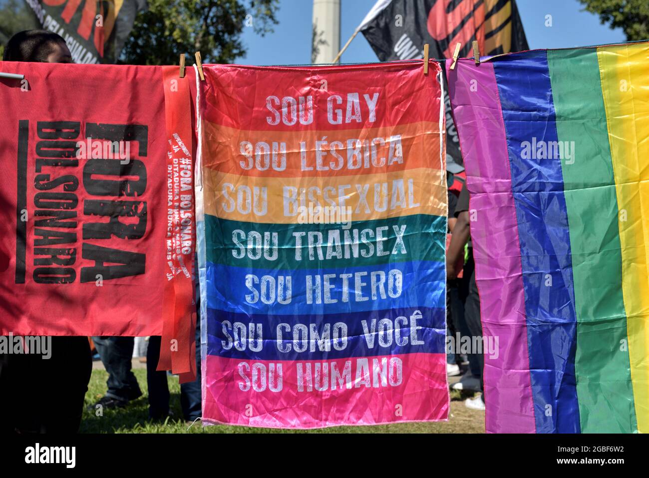 Rio de Janeiro – July 24, 2021: Vendors sell flags with slogans such as ...