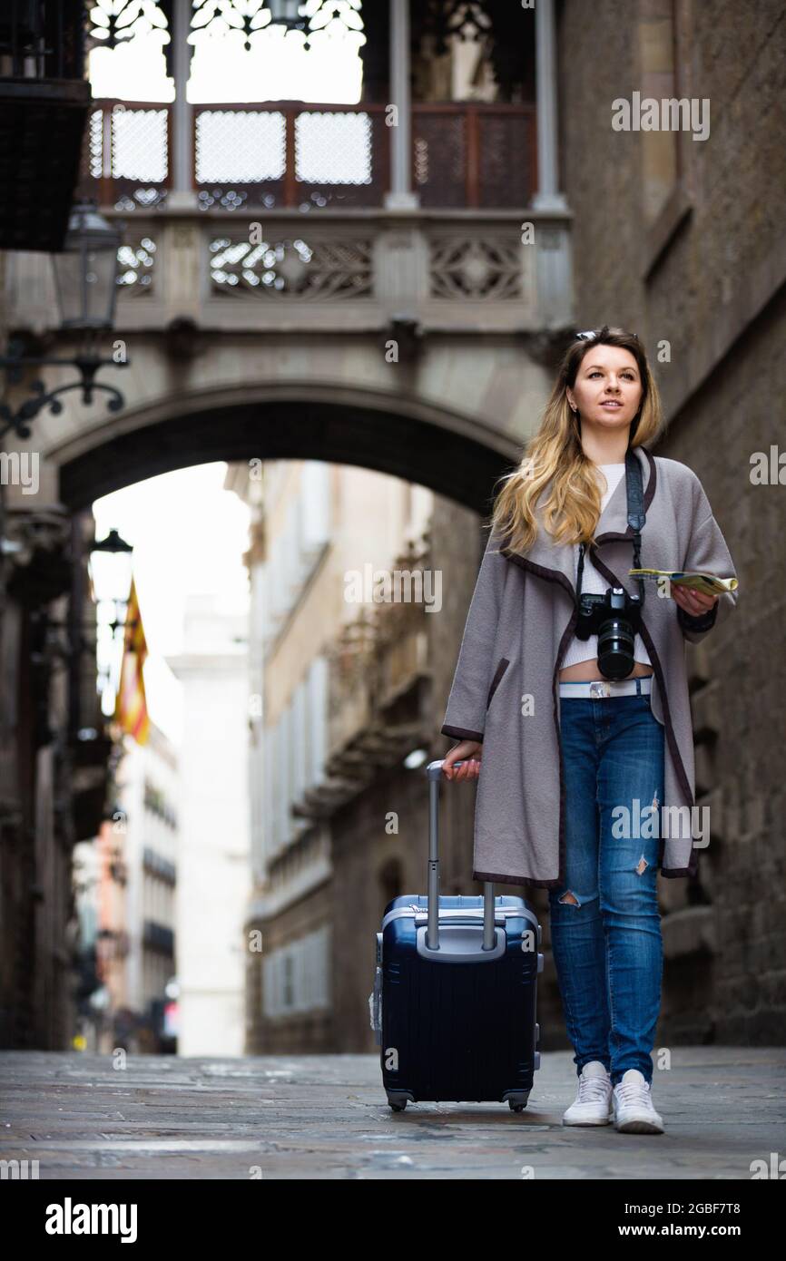 Young girl taking a journey in the city Stock Photo - Alamy