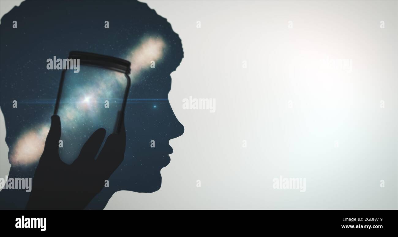 Human figure holding a glass jar with filled with the galaxy against a ...