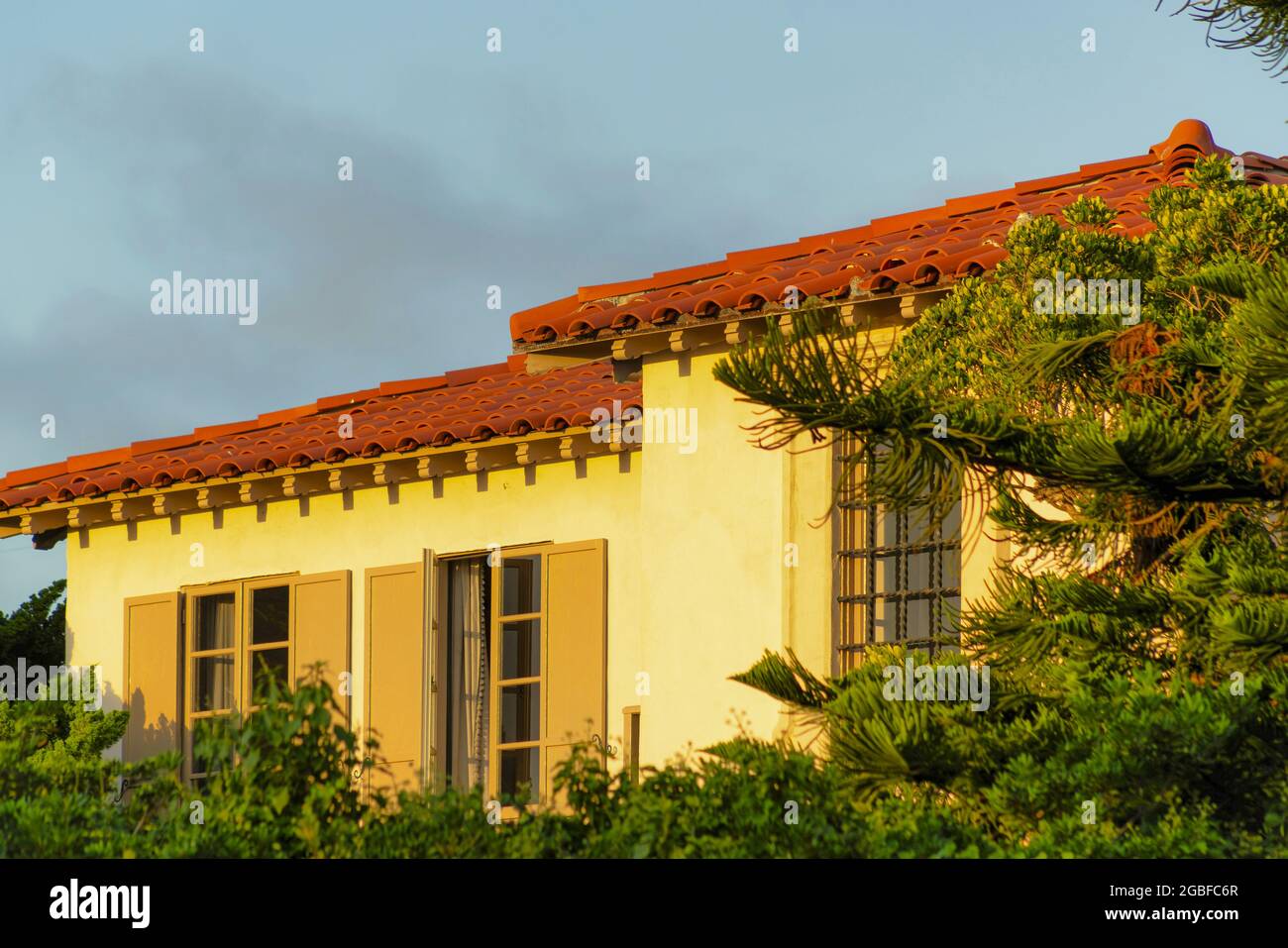 Facade of a beautiful residential house with a tiled roof Stock Photo ...