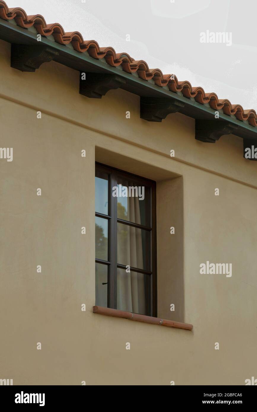 Vertical shot of a facade of a house with a window Stock Photo - Alamy