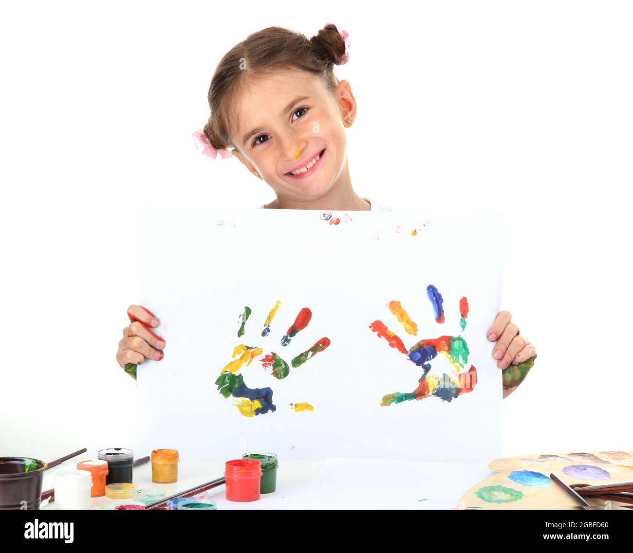 cute little girl with color hand prints, isolated on white Stock Photo ...