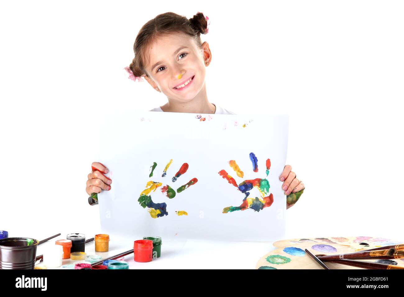 cute little girl with color hand prints, isolated on white Stock Photo ...