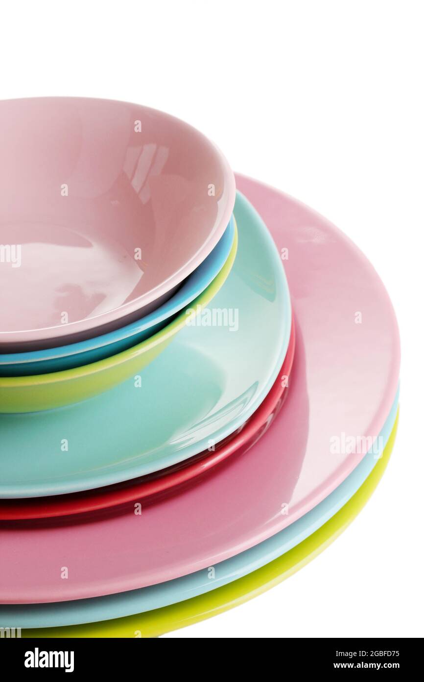 Colorful plates isolated on white Stock Photo - Alamy