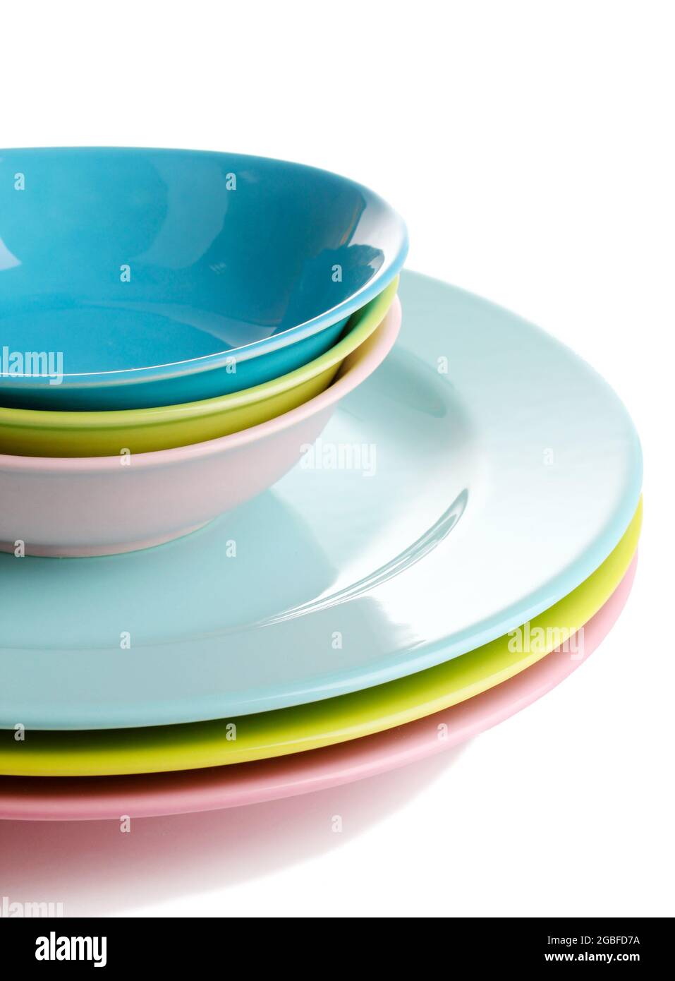 Colorful plates close-up isolated on white Stock Photo - Alamy