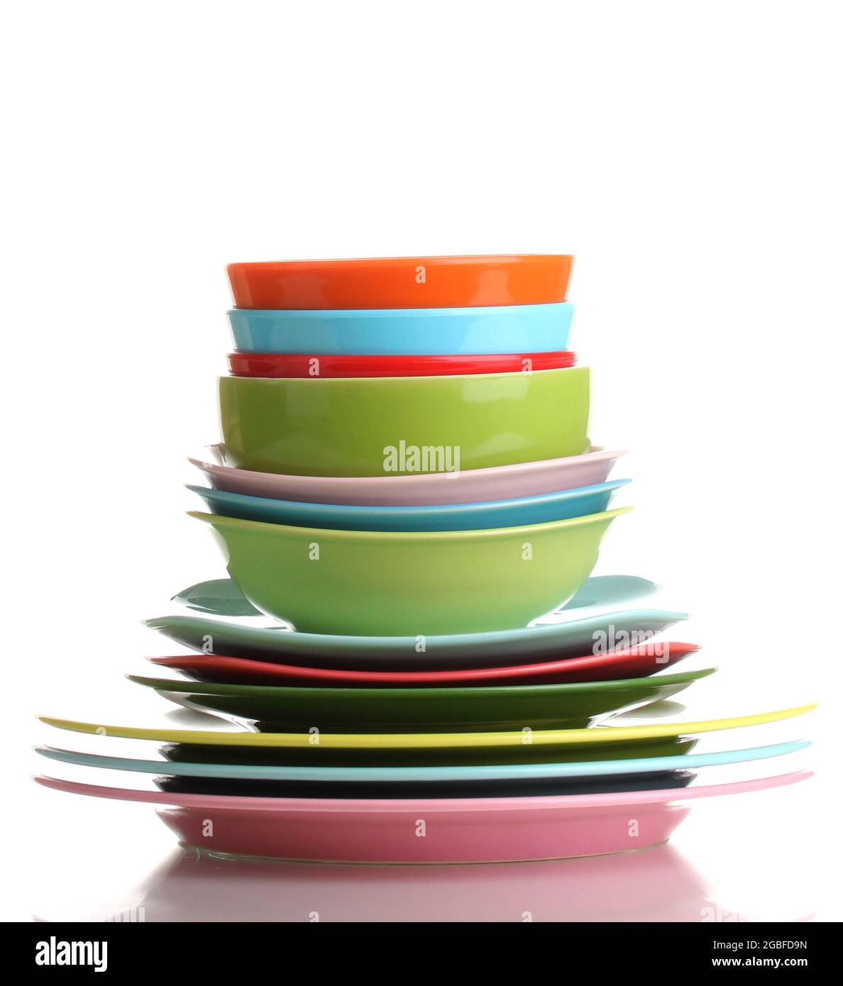 Many colorful plates isolated on white Stock Photo - Alamy