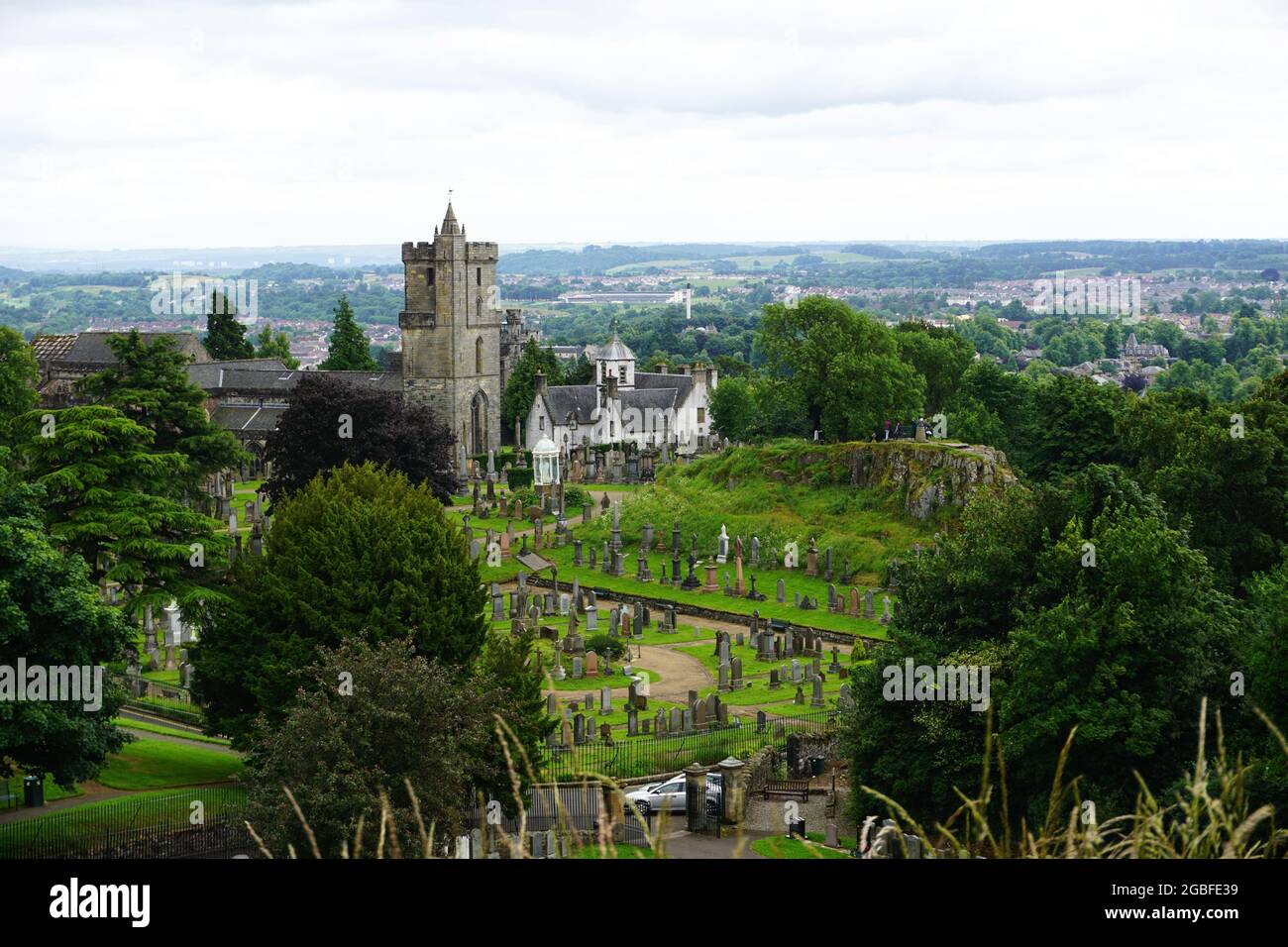 A view of The Church of the Holy Rude, its tower and historic cemetery ...