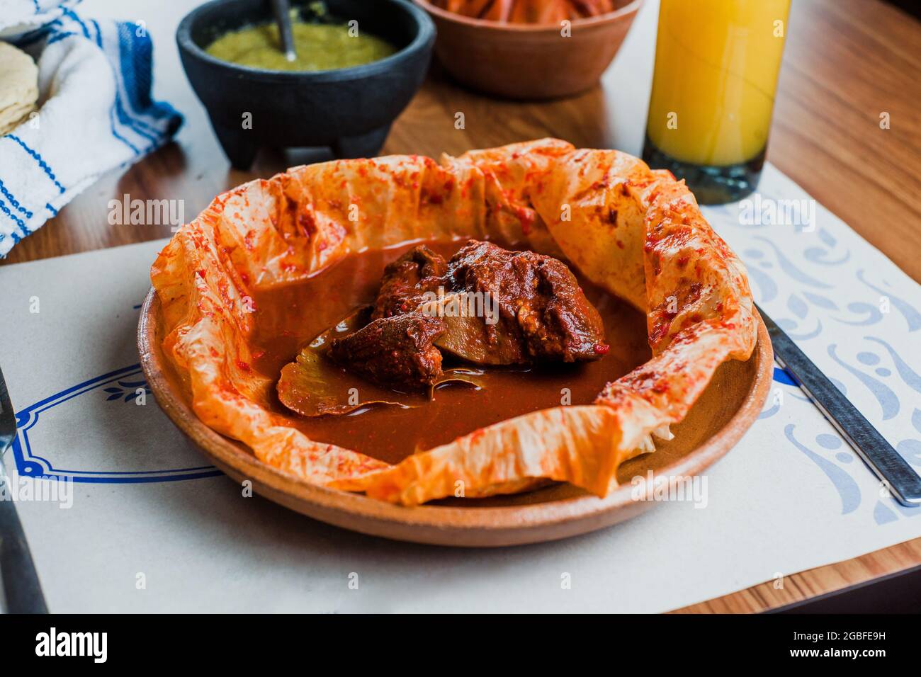 Mixiote and salsa verde, traditional mexican dish in Mexico City Stock ...