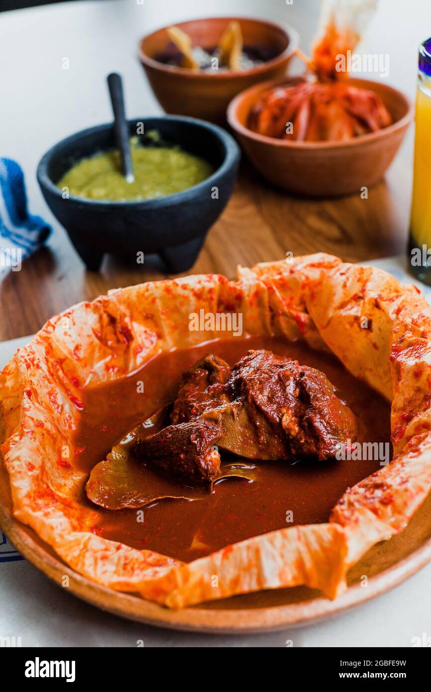 Mixiote and salsa verde, traditional mexican dish in Mexico City Stock ...