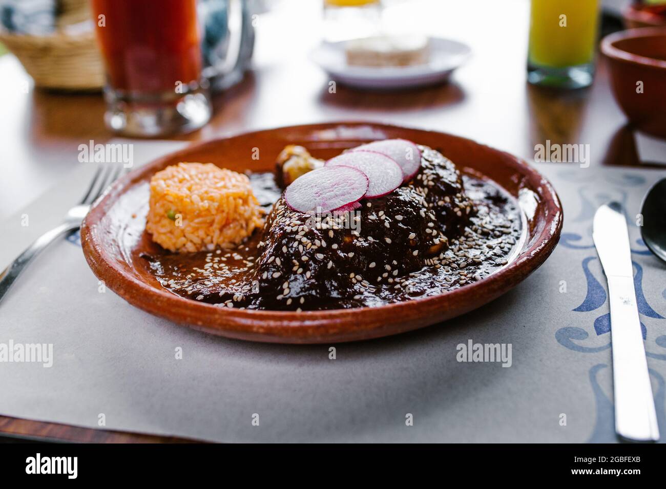Mole poblano with red rice traditional mexican cuisine in Mexico City ...