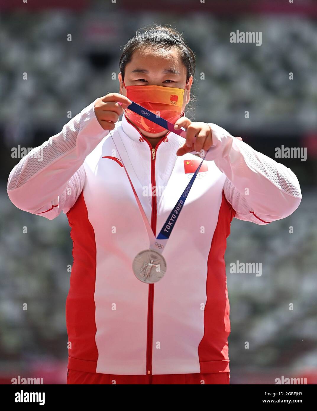 Tokyo, Japan. 4th Aug, 2021. Silver medalist Wang Zheng of China puts ...
