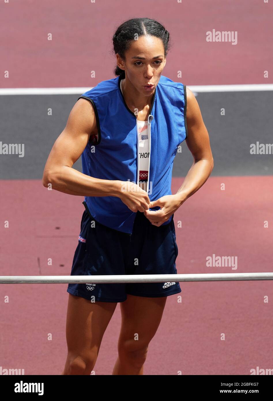 Great Britain's Katarina Johnson-Thompson keeps cool using a cooling ...