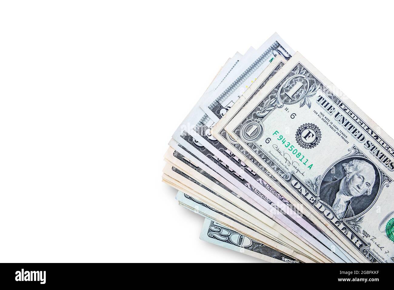 A lot of cash US dollars assorted bills, cash pile on white background ...