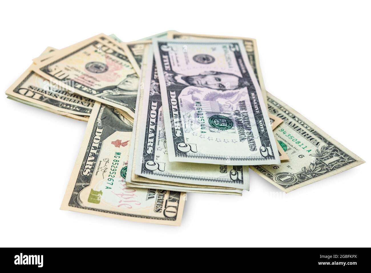 A lot of cash US dollars assorted bills, cash pile on white background ...
