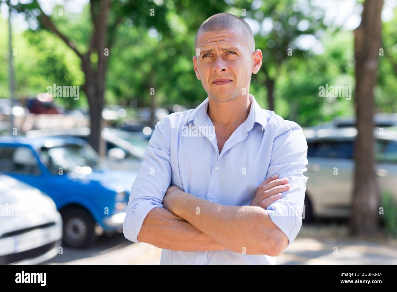 European man standing outside Stock Photo - Alamy