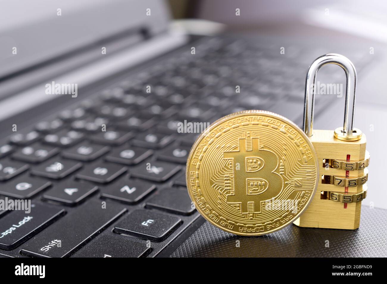 bitcoin with lock on laptop keyboard, bitcoin security cryptocurrency ...