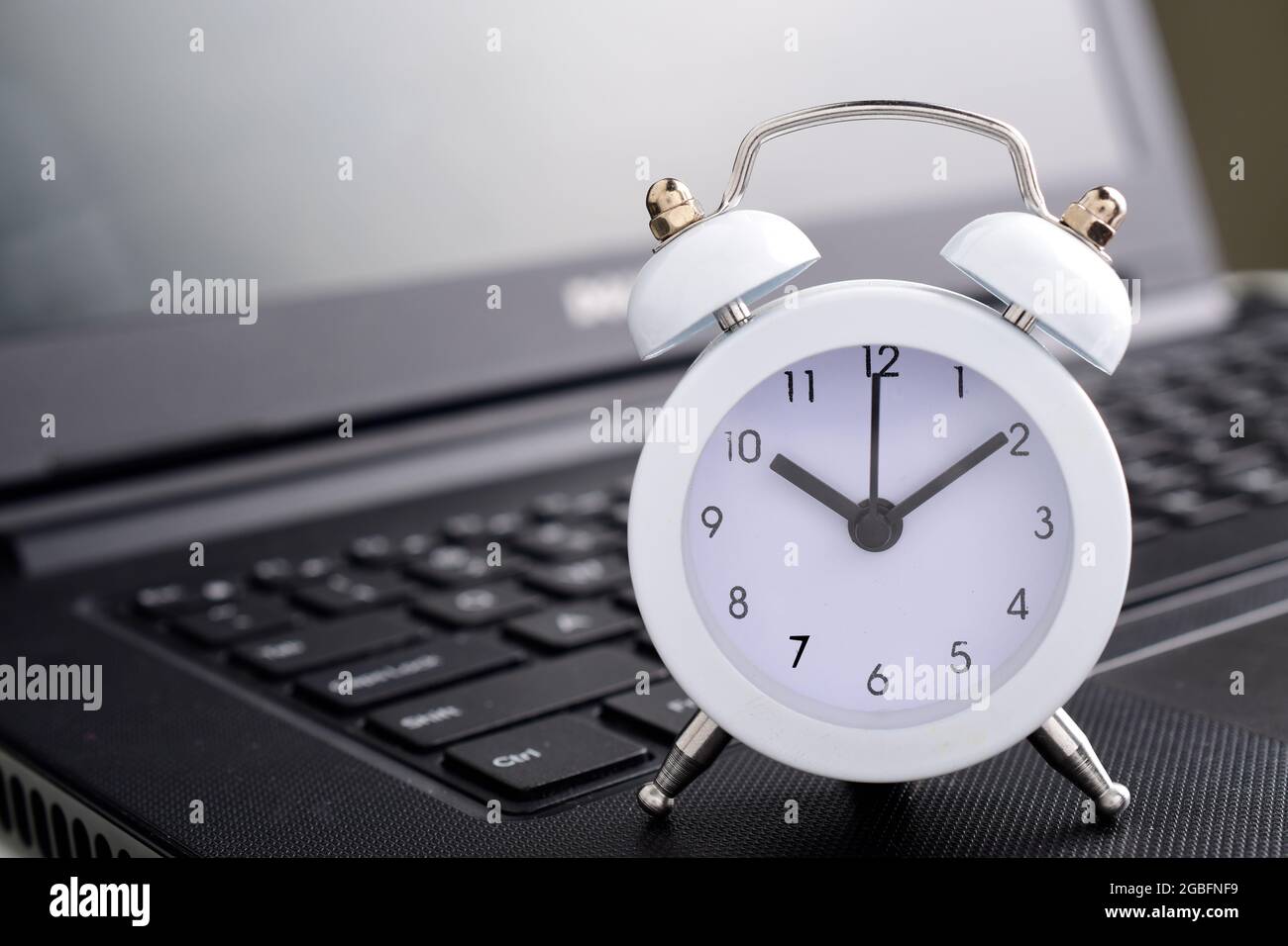 clock on laptop computer concept for time management concept Stock ...