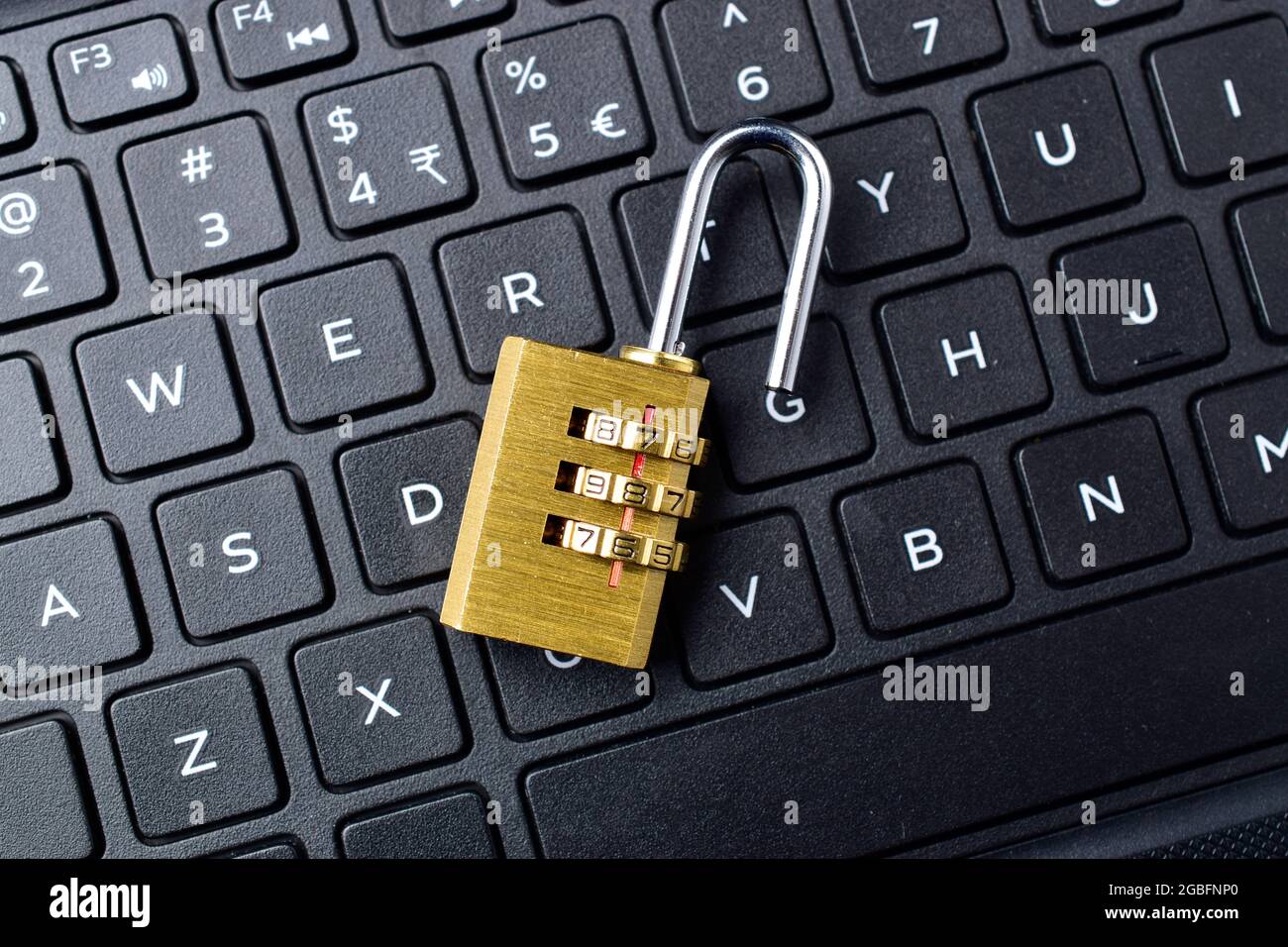 Unlock Padlock on keyboard. Hacker attack, information leak concept ...