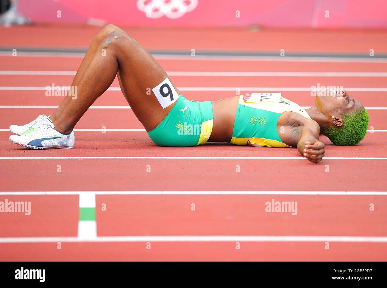 Tokyo, Japan. 4th Aug, 2021. Janieve Russell of Jamaica reacts after ...