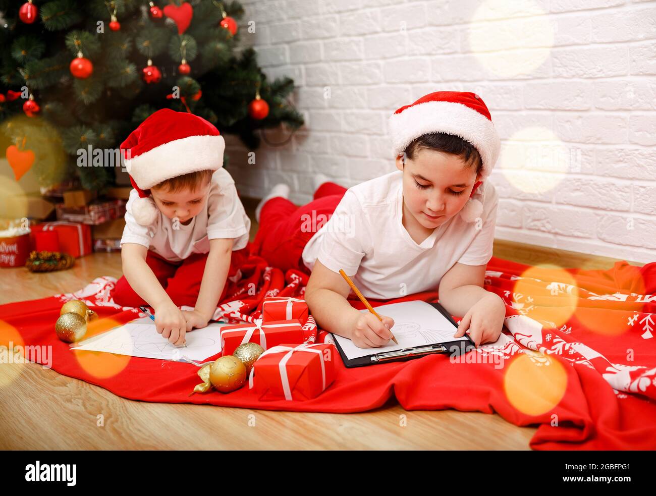 A boy child writing a postcard hi-res stock photography and images - Alamy