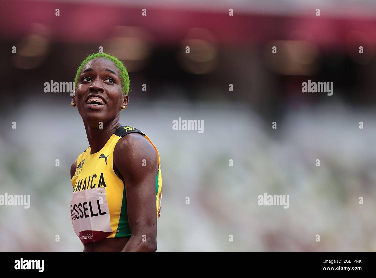 Tokyo, Japan. 4th Aug, 2021. Janieve Russell of Jamaica reacts after ...
