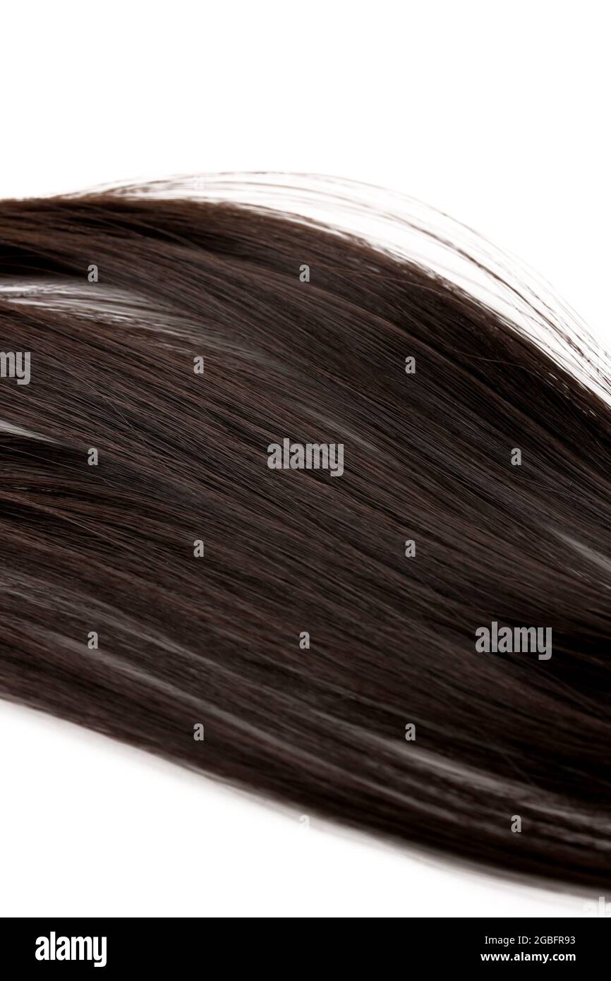 Smooth brown hair close-up isolated on white Stock Photo - Alamy