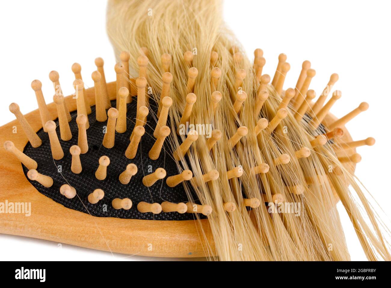 Blond curls brushing comb isolated on white Stock Photo - Alamy