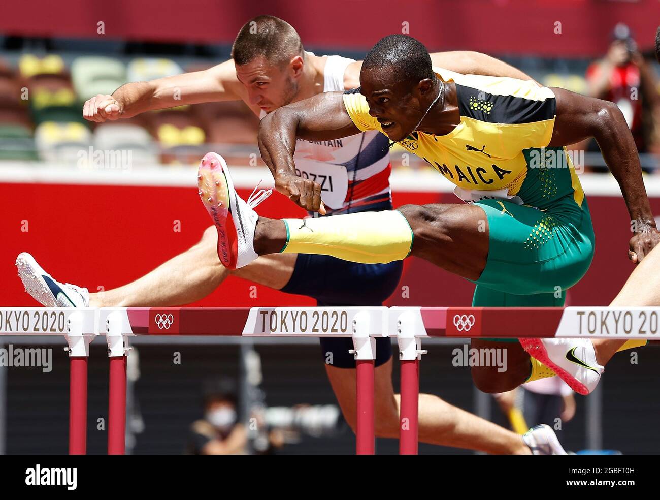 Tokyo, Japan. 4th Aug, 2021. Ronald Levy (R) of Jamaica competes during ...