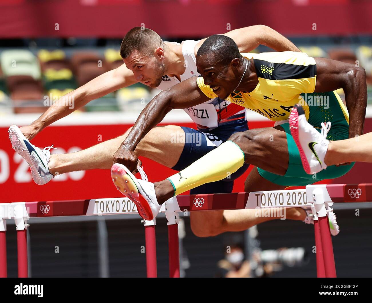Tokyo, Japan. 4th Aug, 2021. Ronald Levy (R) of Jamaica competes during ...