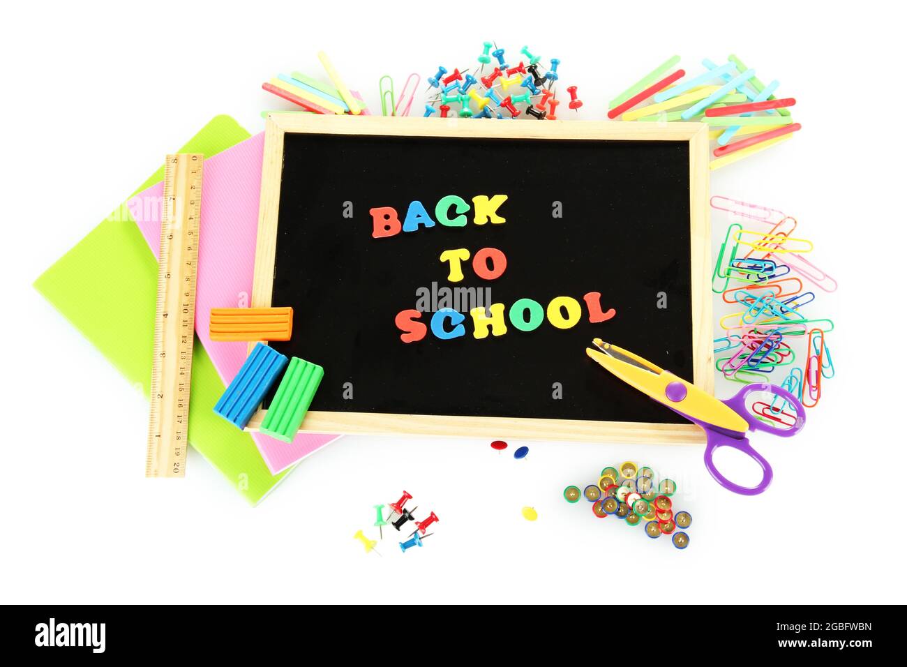 Small chalkboard with school supplies on white background. Back to ...