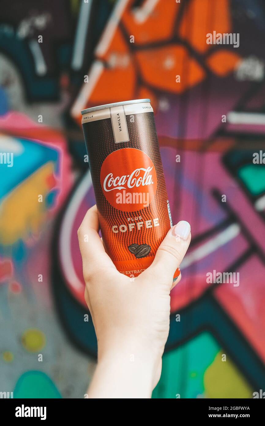Kiev, Ukraine - june 2021. Caucasian woman drinks Coca-Cola drink in ...