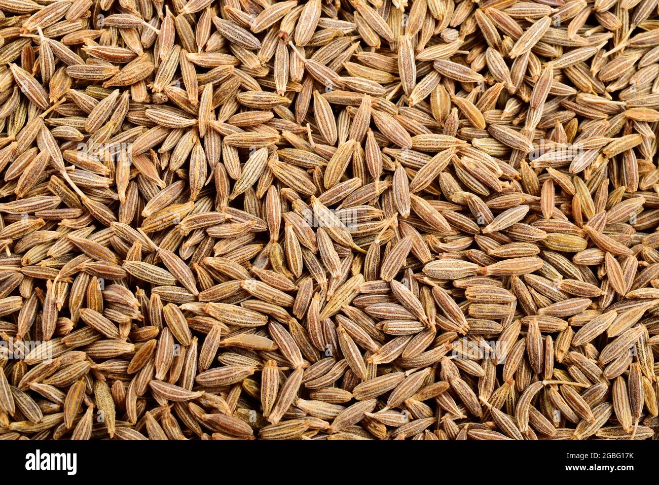 Top View Of Cumin Seeds Texture Stock Photo - Alamy