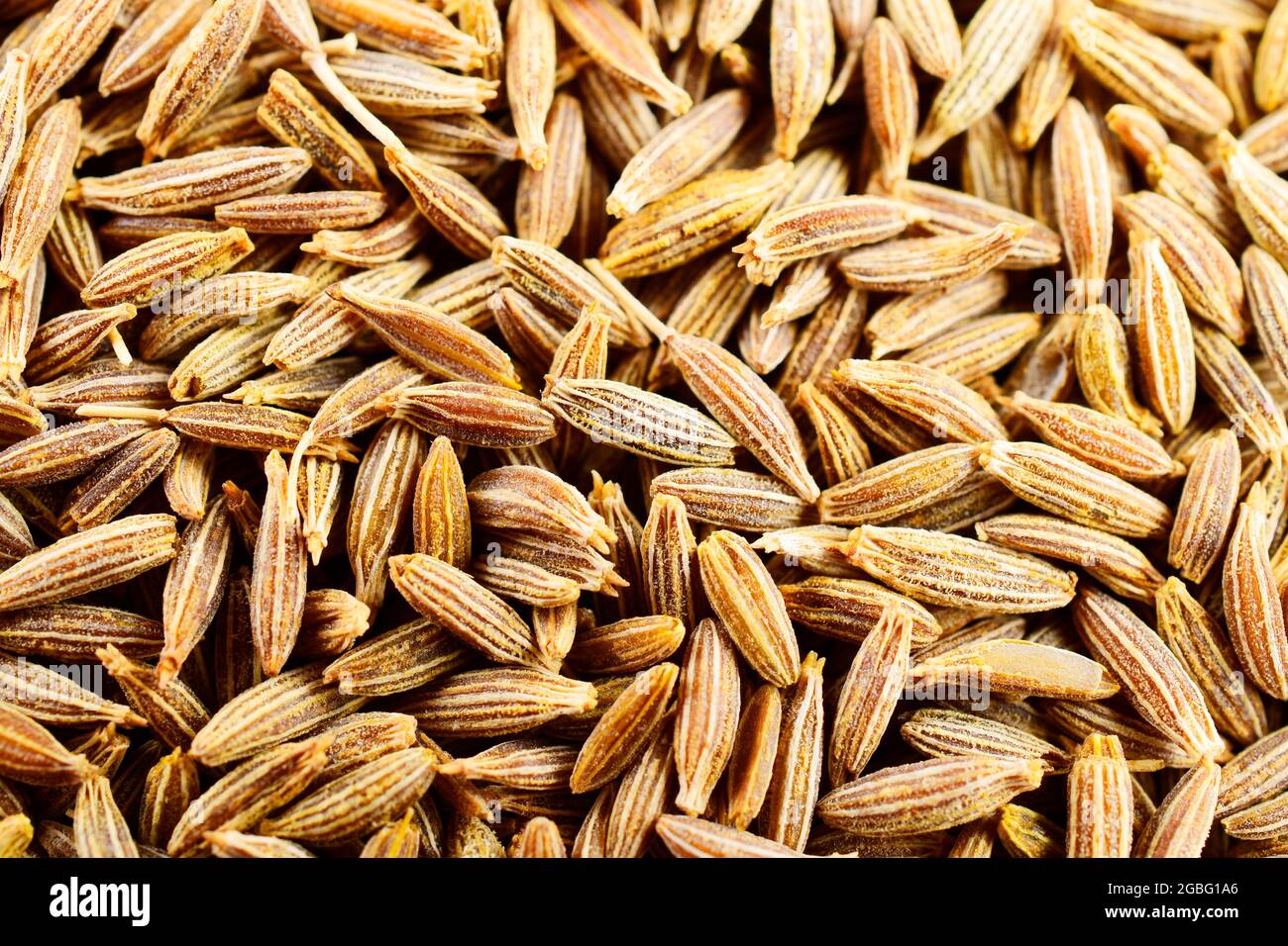 Macro Image Of Cumin Seeds Stock Photo - Alamy
